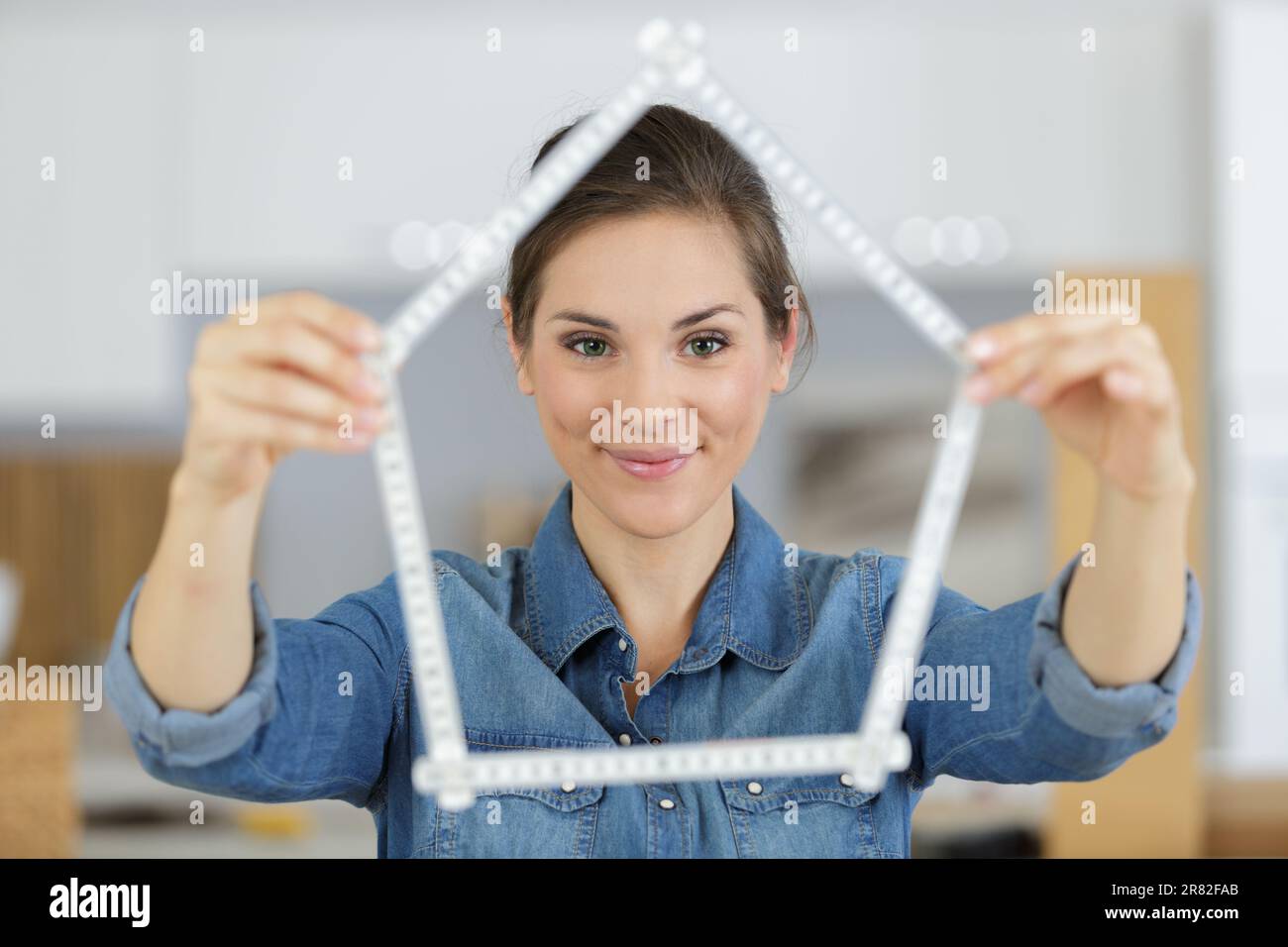 Woman build house from hi-res stock photography and images - Alamy