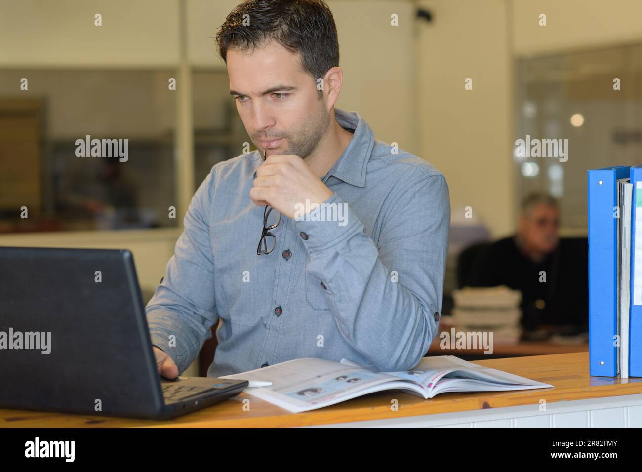 Worker concentrating hi-res stock photography and images - Alamy