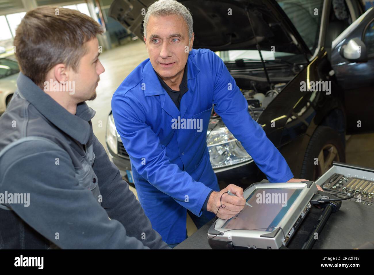 professional car mechanic working in auto repair service Stock Photo ...
