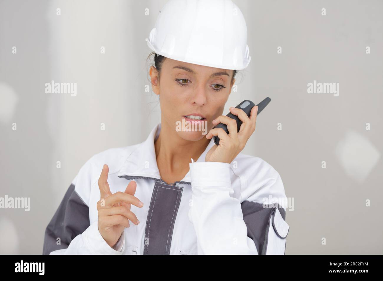 professional foreman with radio at the construction site Stock Photo ...