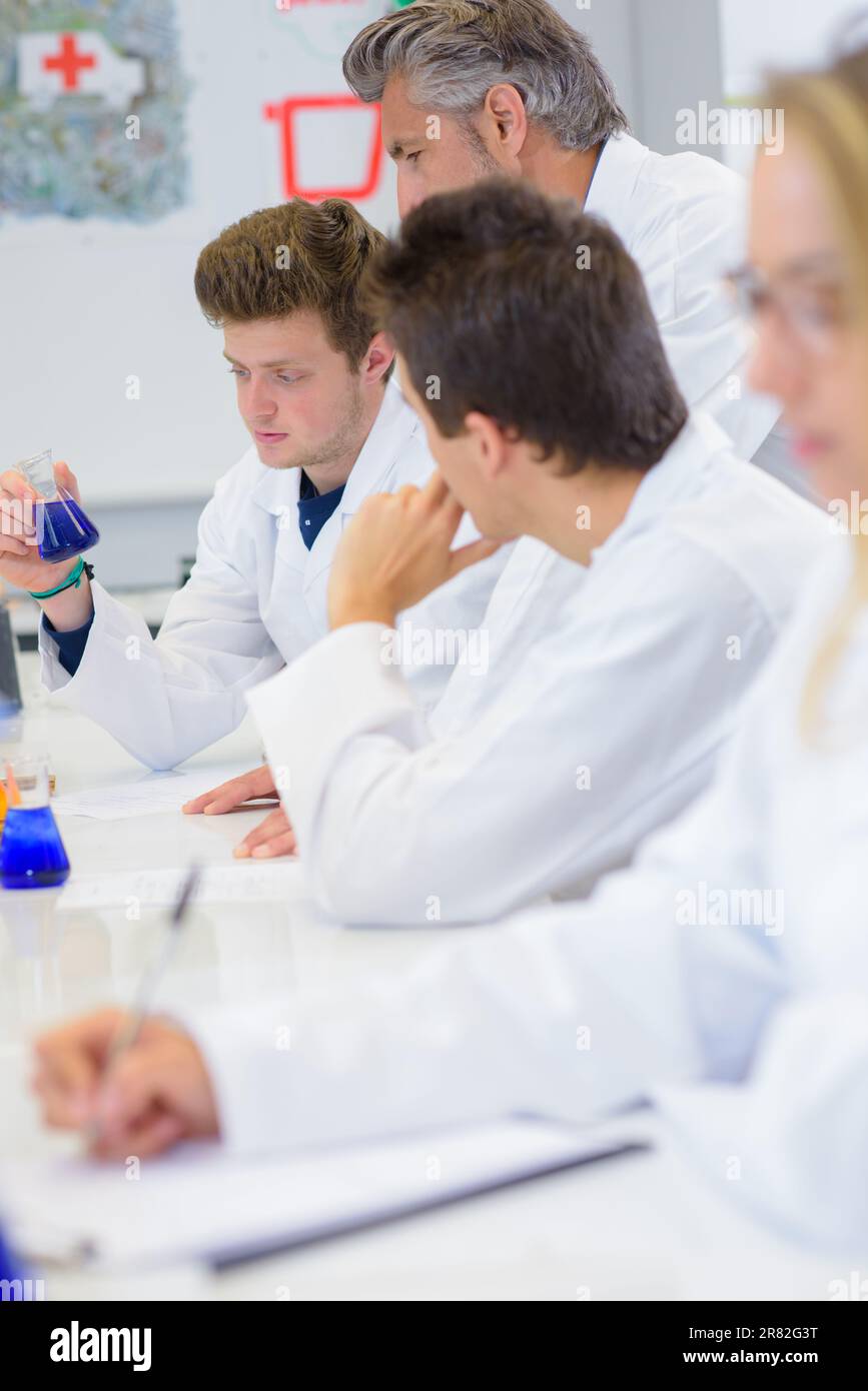 student and teacher - scientific lecture Stock Photo - Alamy
