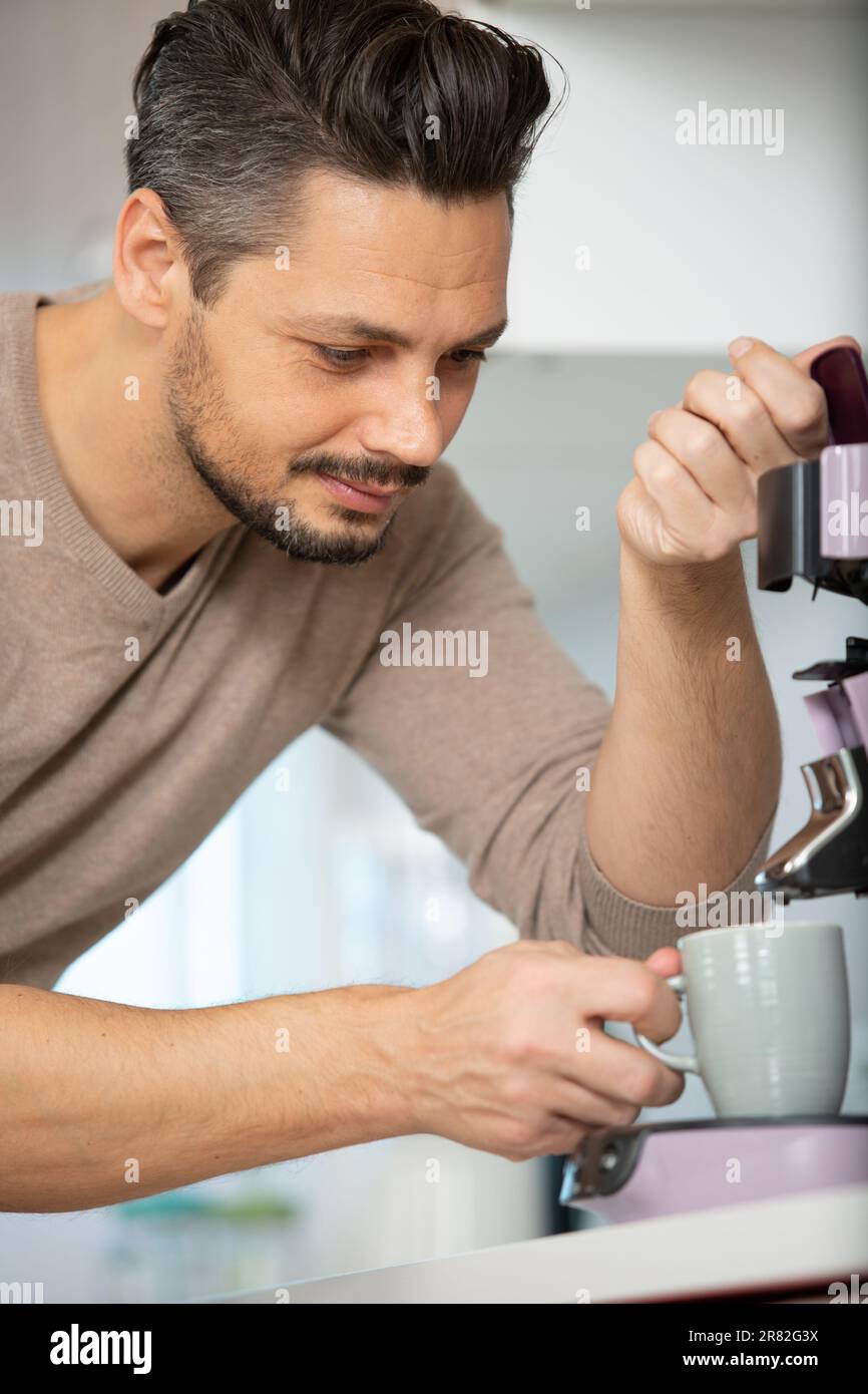 Man using machine pot hi-res stock photography and images - Alamy