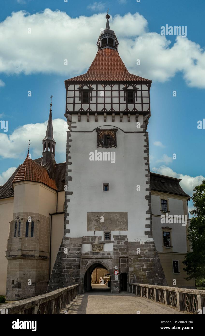 Aerial view of Blatna medieval water castle with towers, turrets, plus ...
