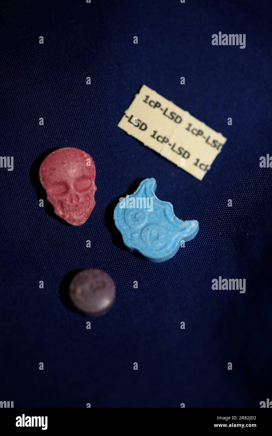 A mixed set of drugs and medicines pills containing mdma and lsd stick ...