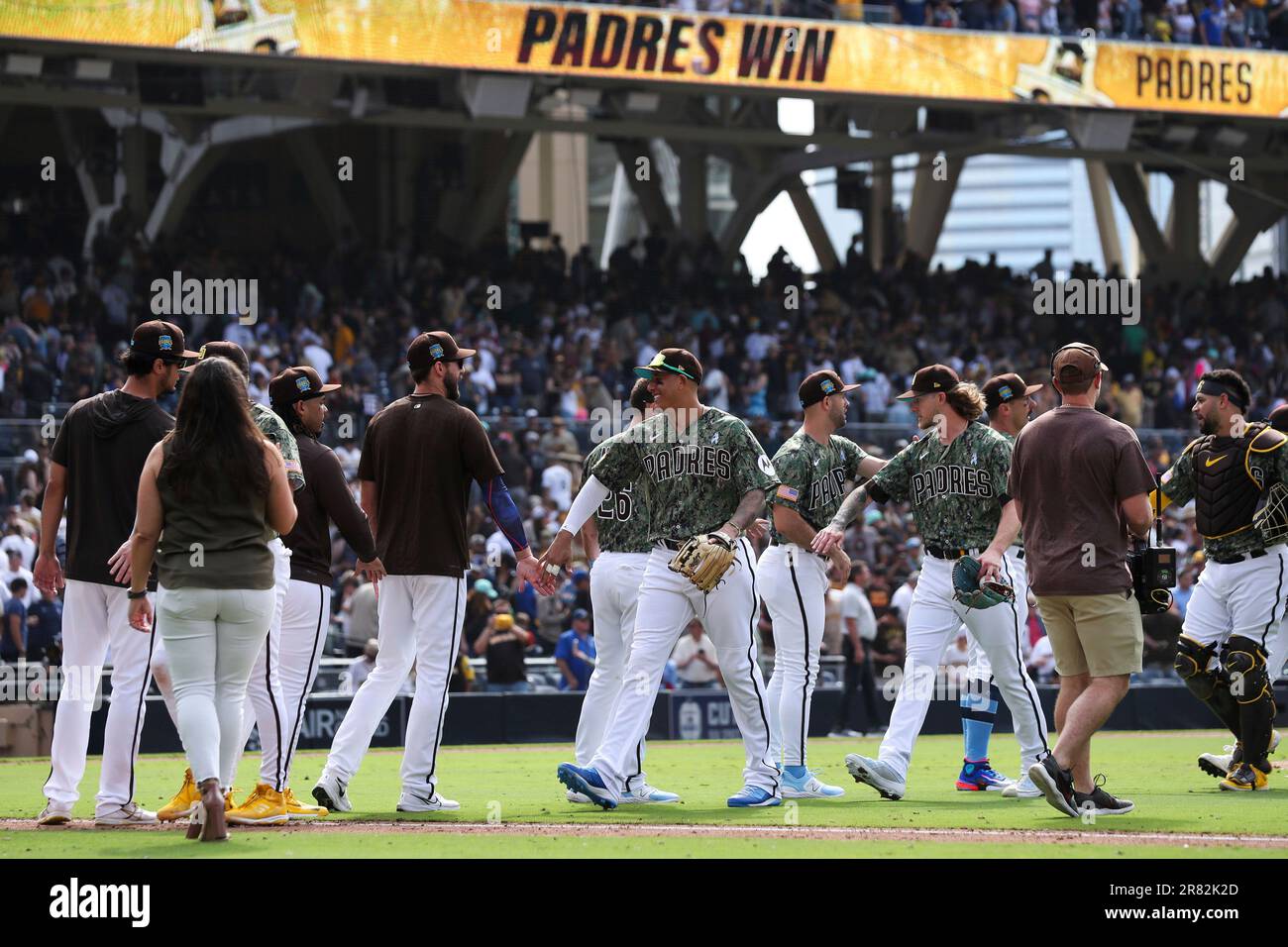 San Diego Padres Manny Machado Center Is Congratulated By Teammates