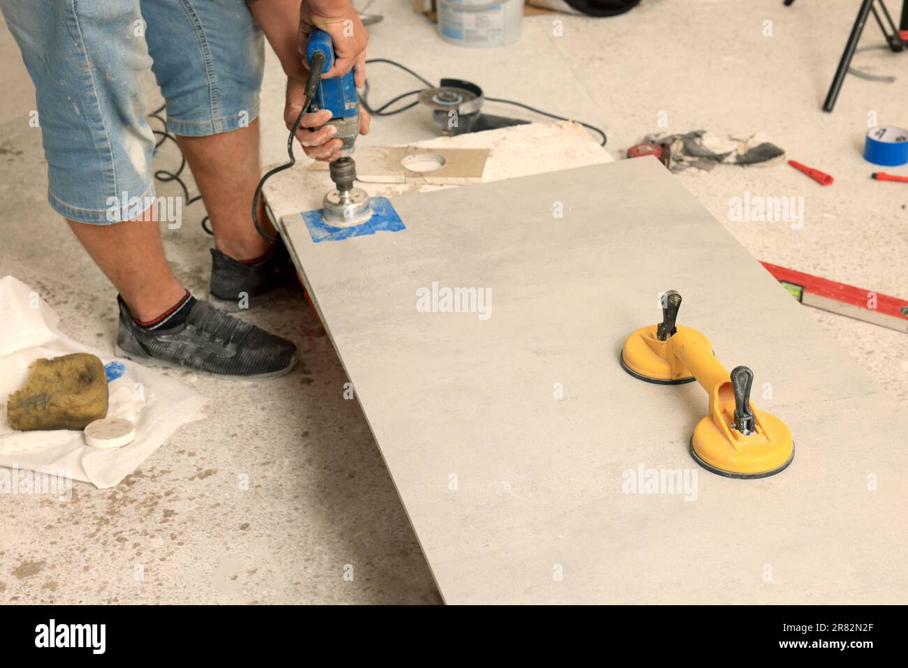 Worker making socket hole hi-res stock photography and images - Alamy