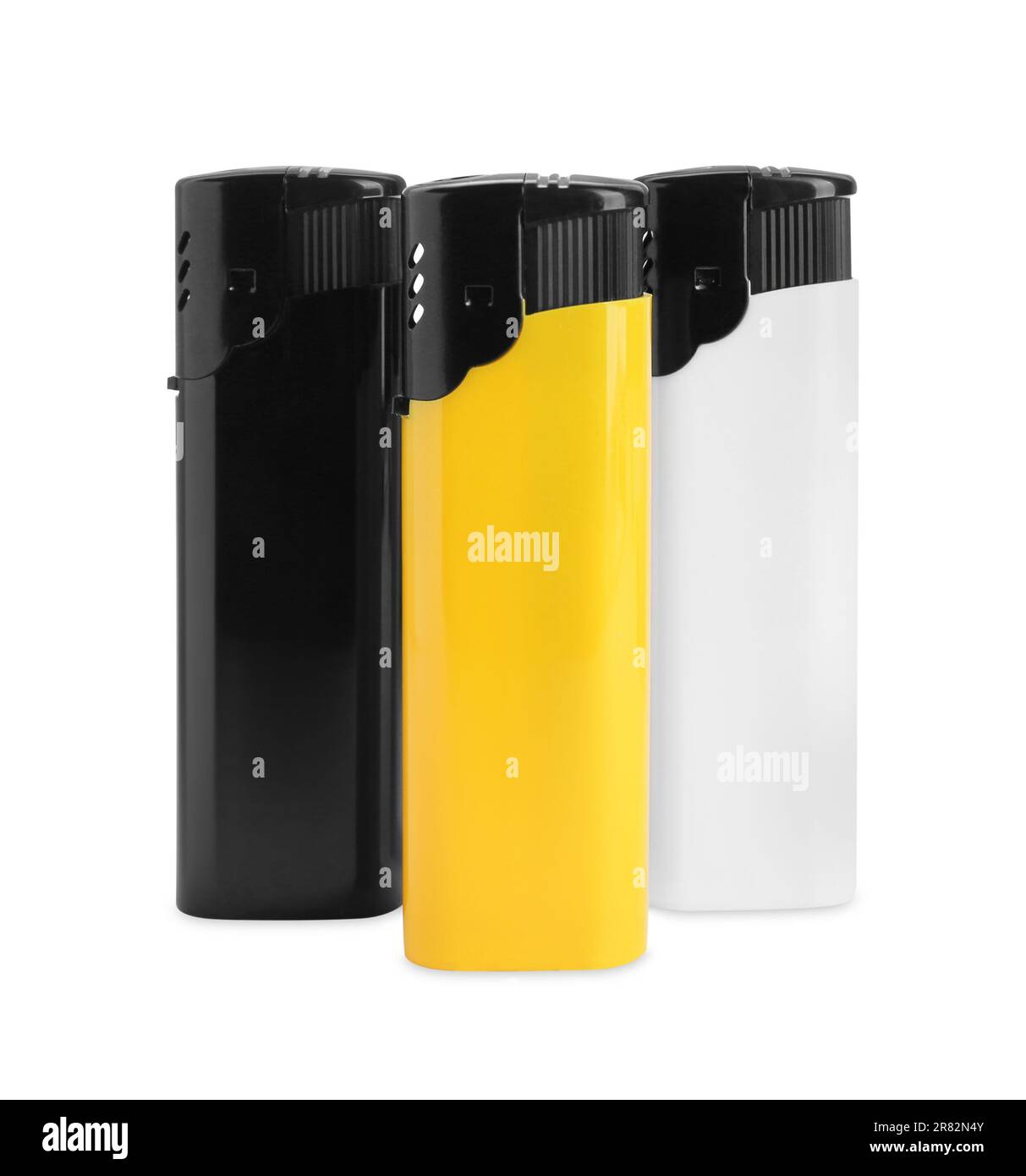 Stylish small pocket lighters on white background Stock Photo - Alamy