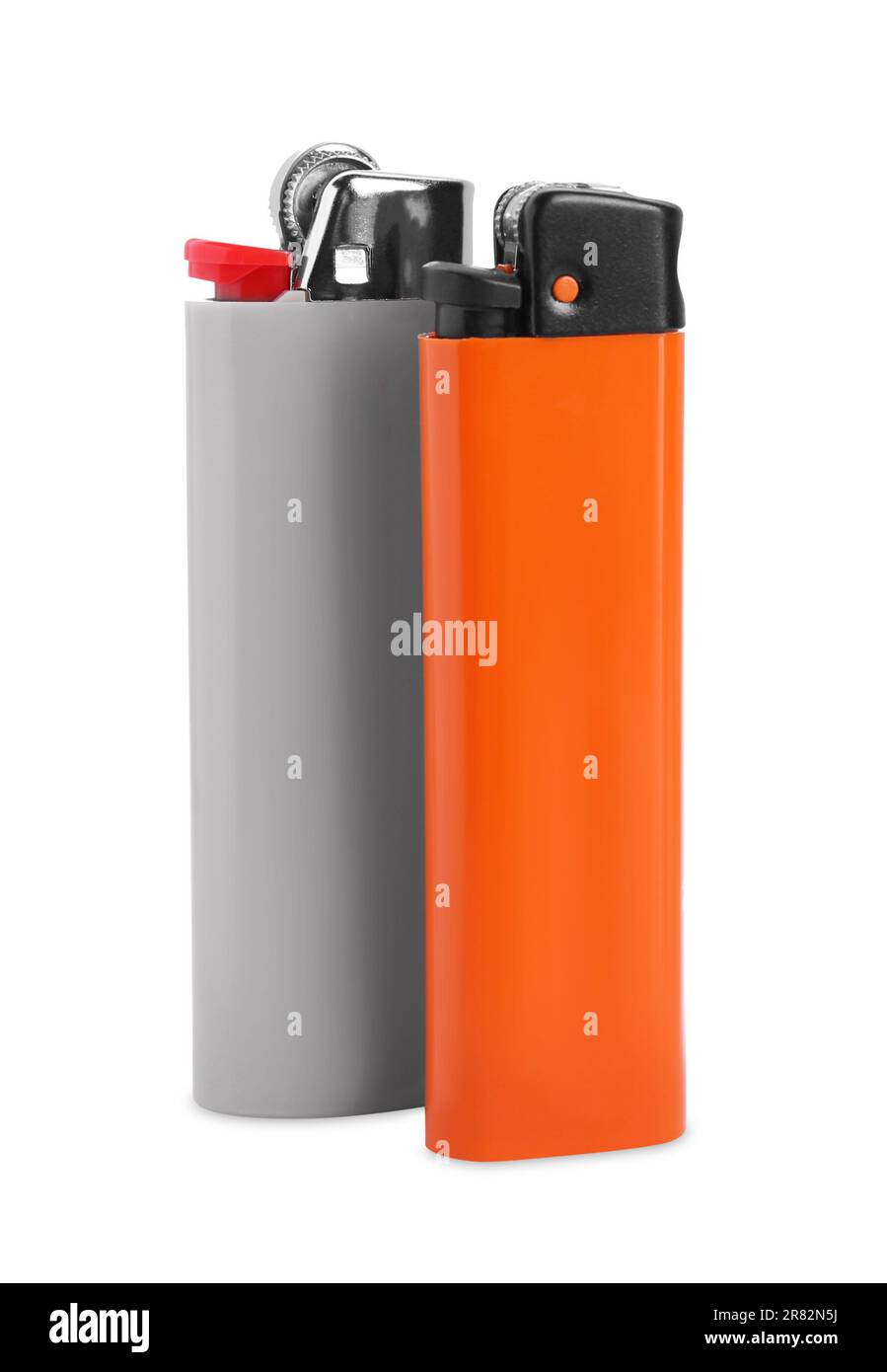 Stylish small pocket lighters on white background Stock Photo - Alamy