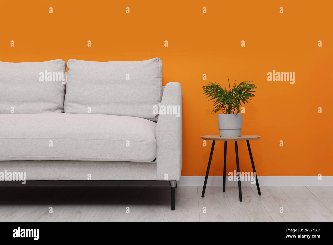 Modern interior orange sofa hi-res stock photography and images - Alamy