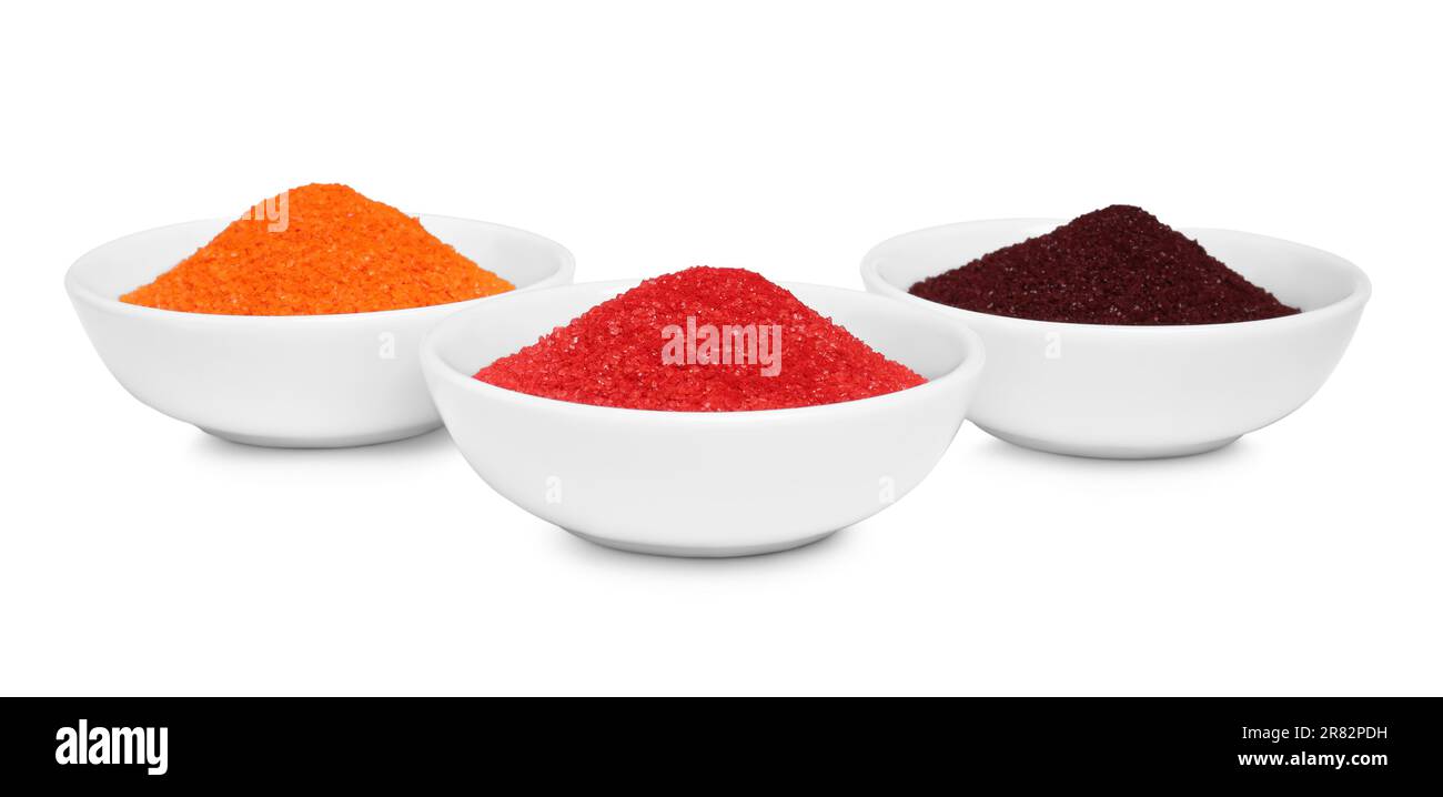 Bowls with food coloring on white background Stock Photo - Alamy