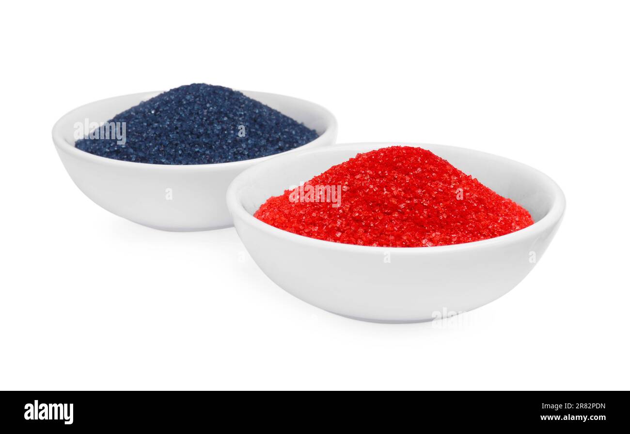 Bowls with food coloring on white background Stock Photo - Alamy