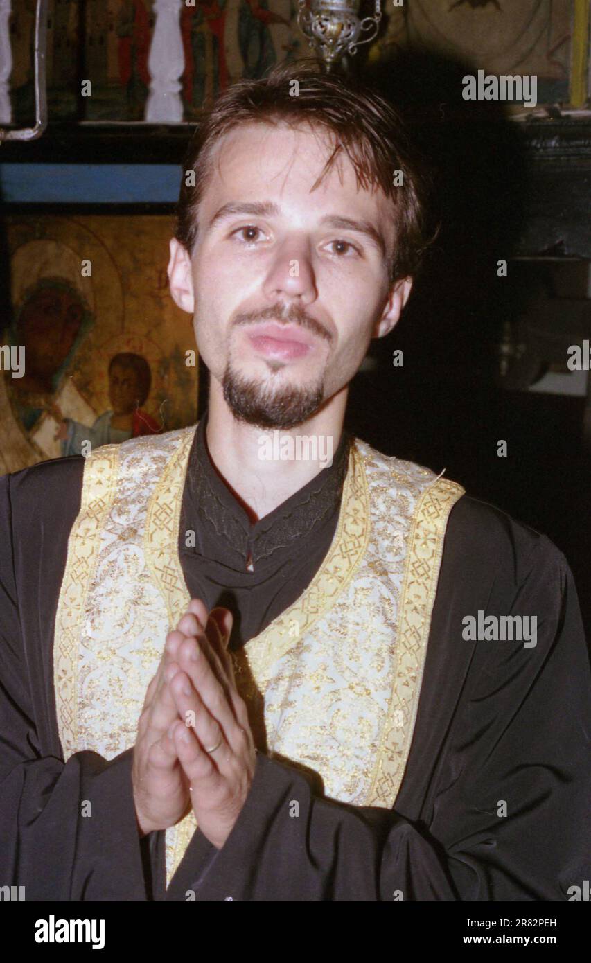 Eastern orthodox praying young people hi-res stock photography and ...