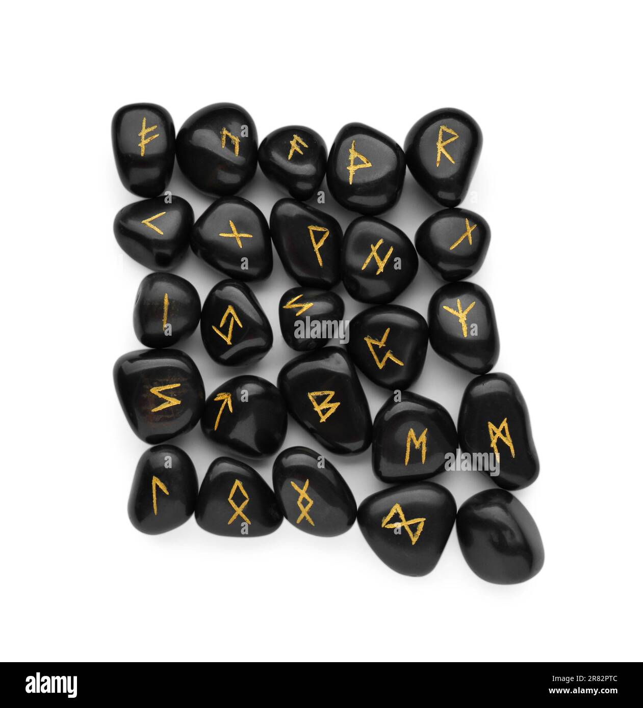 Many black rune stones isolated on white, top view Stock Photo - Alamy