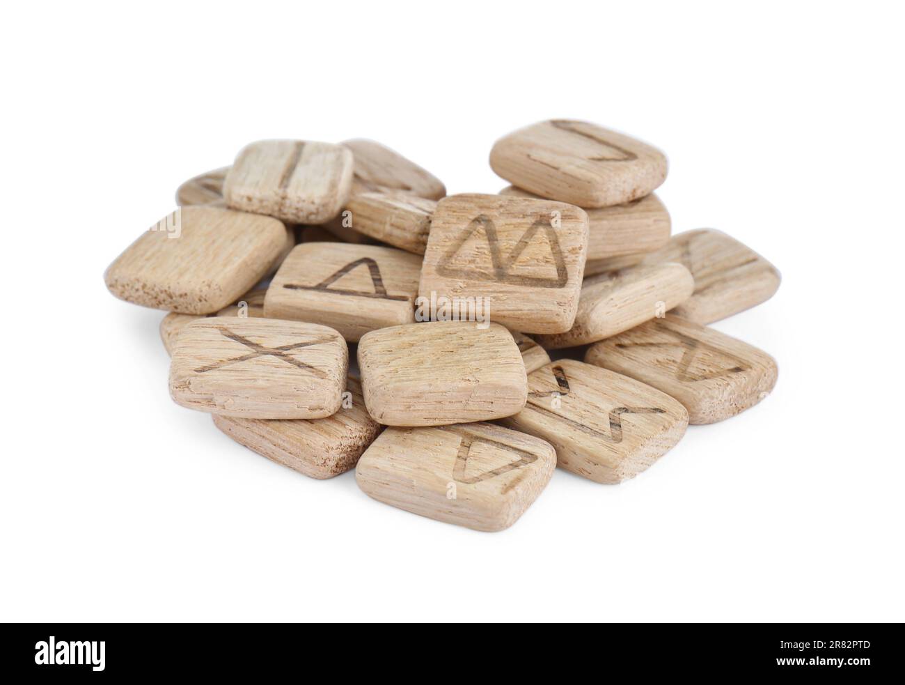 Pile of wooden runes isolated on white Stock Photo - Alamy