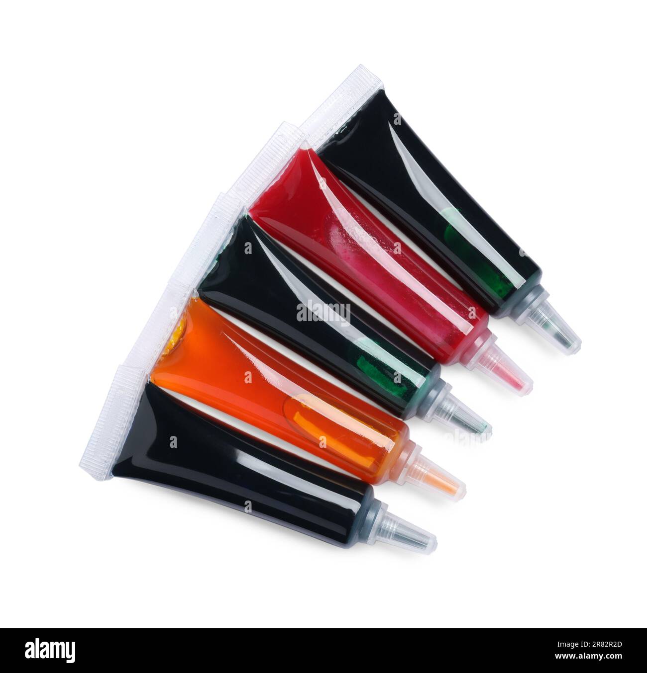 Tubes with different food coloring on white background, top view Stock ...