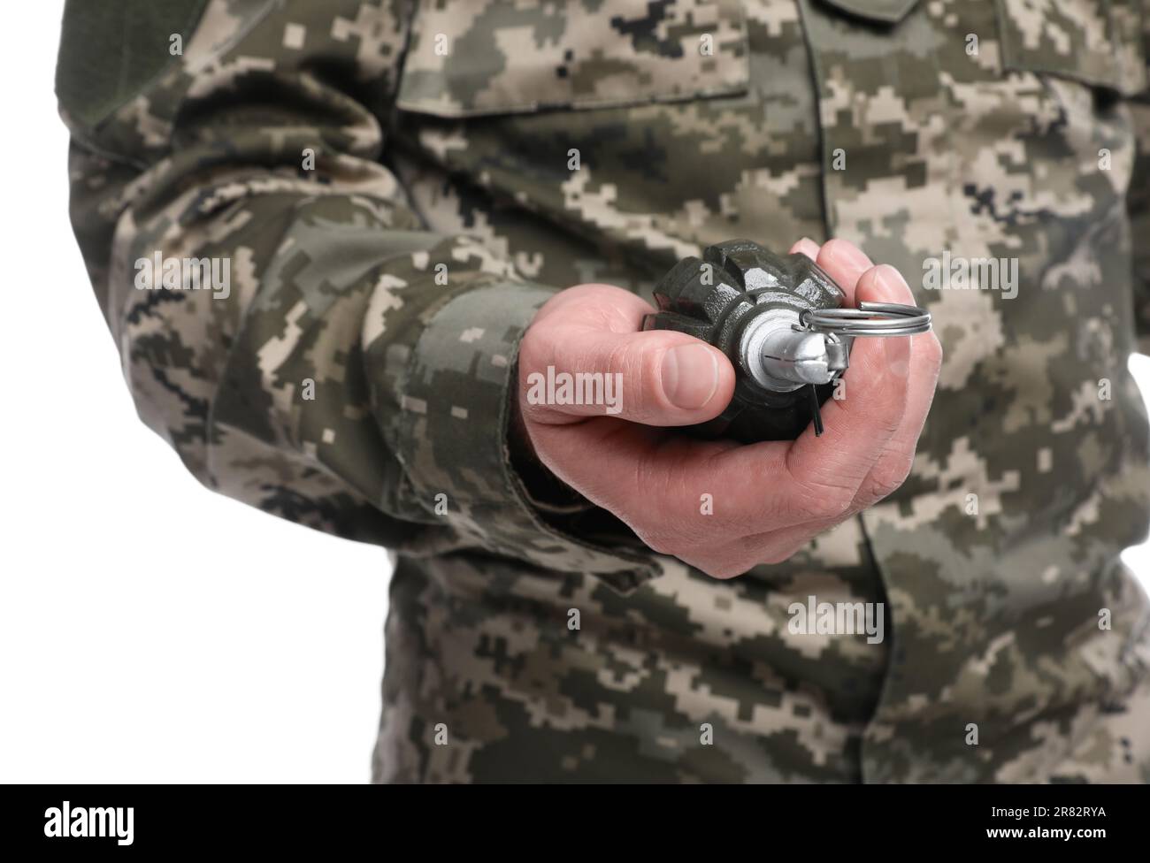 Soldier holding hand grenade on white background. Military service ...
