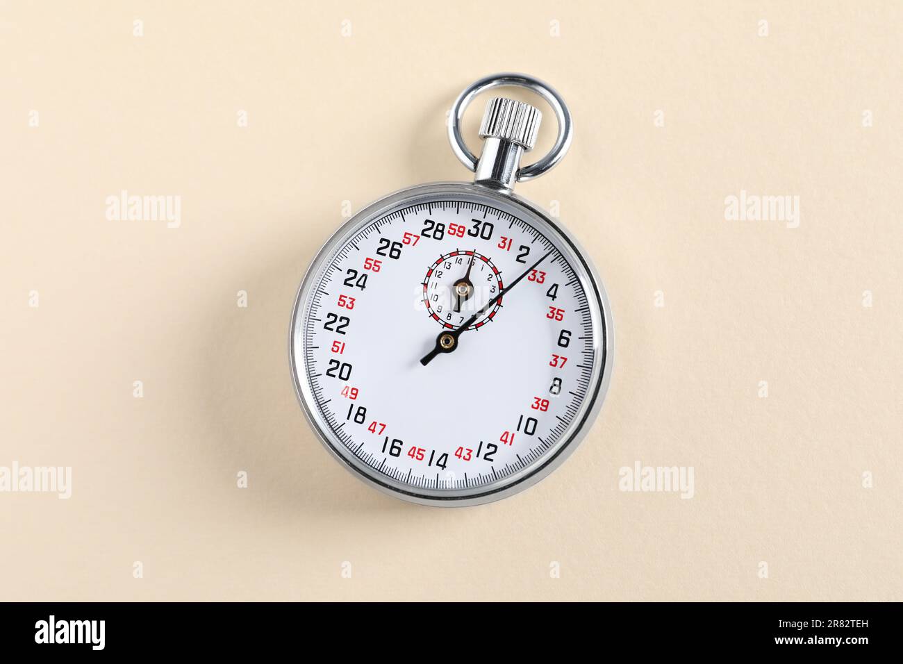 Vintage timer on beige background, top view. Measuring tool Stock Photo ...