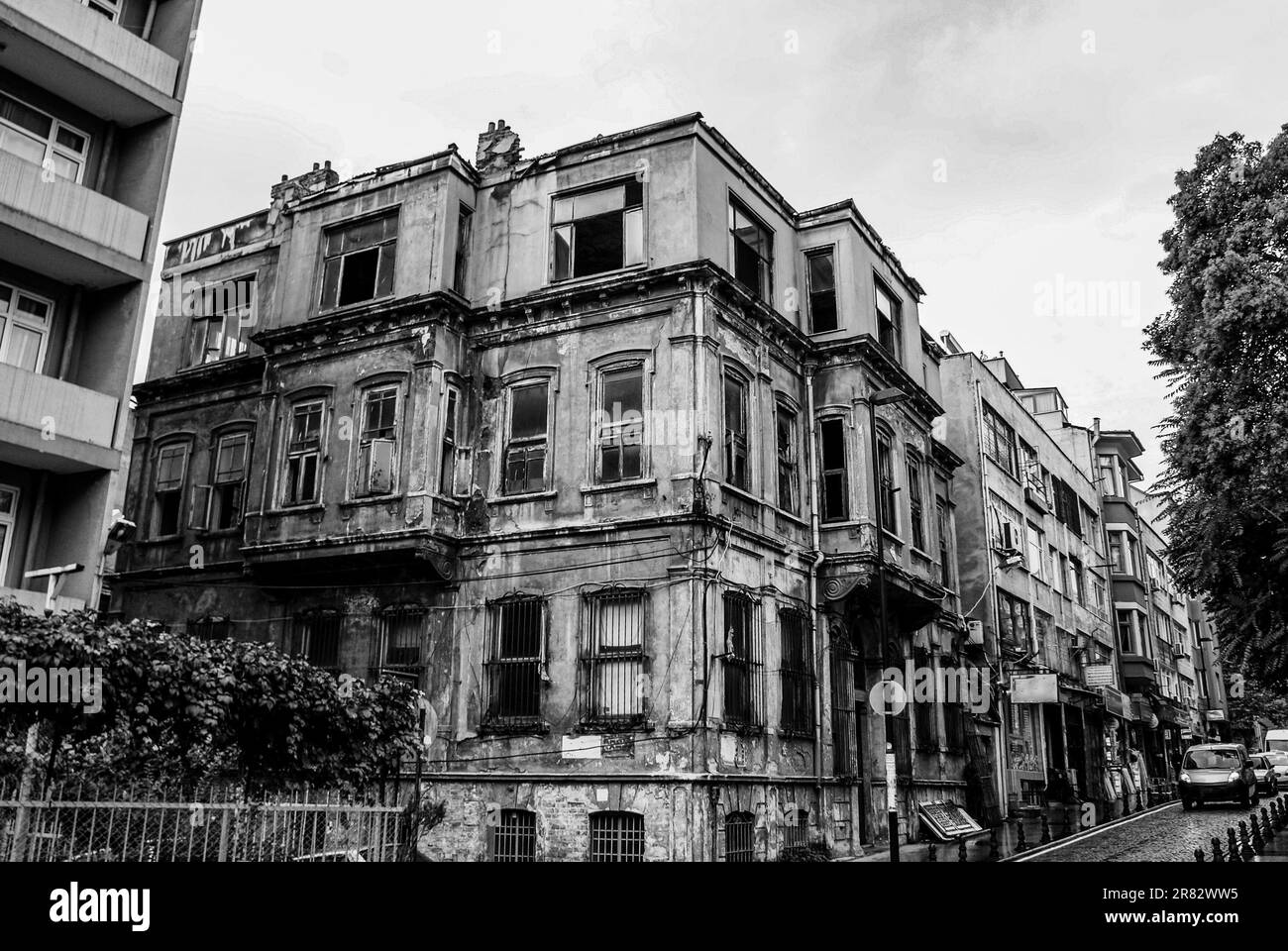 a narrow city street with old buildings in the background Stock Photo ...