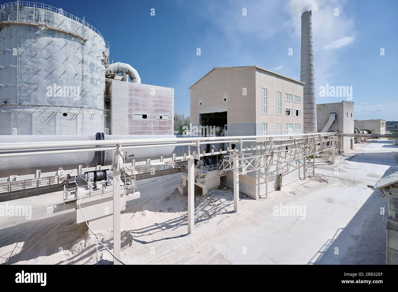 Large manufacturing plant of silica products under blue sky Stock Photo ...