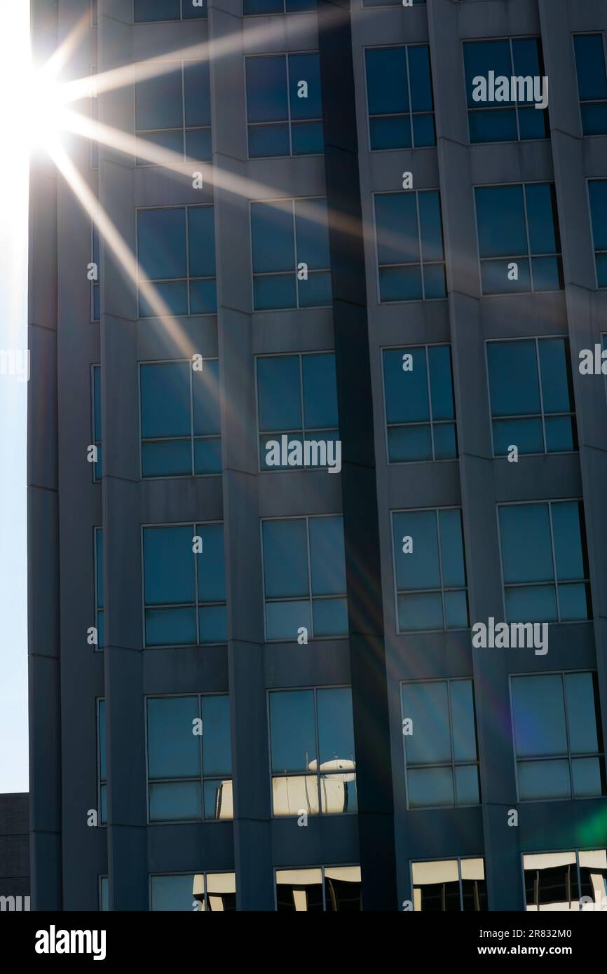 A photograph of a high-rise building in the afternoon reveals a multi ...