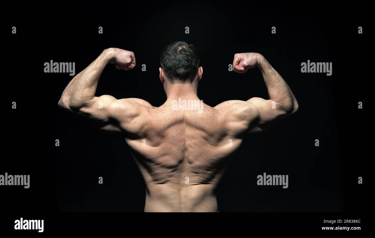 bodybuilder man muscular back isolated on black. bodybuilder man ...