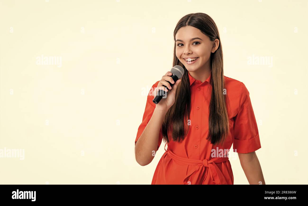 photo of singer teen girl hold microphone, copy space. teen girl singer ...