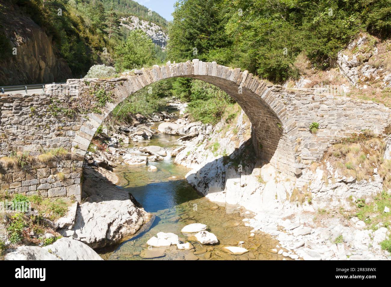 Ancient Roman bridge along the road to Anso, Spain. Ordesa valley ...