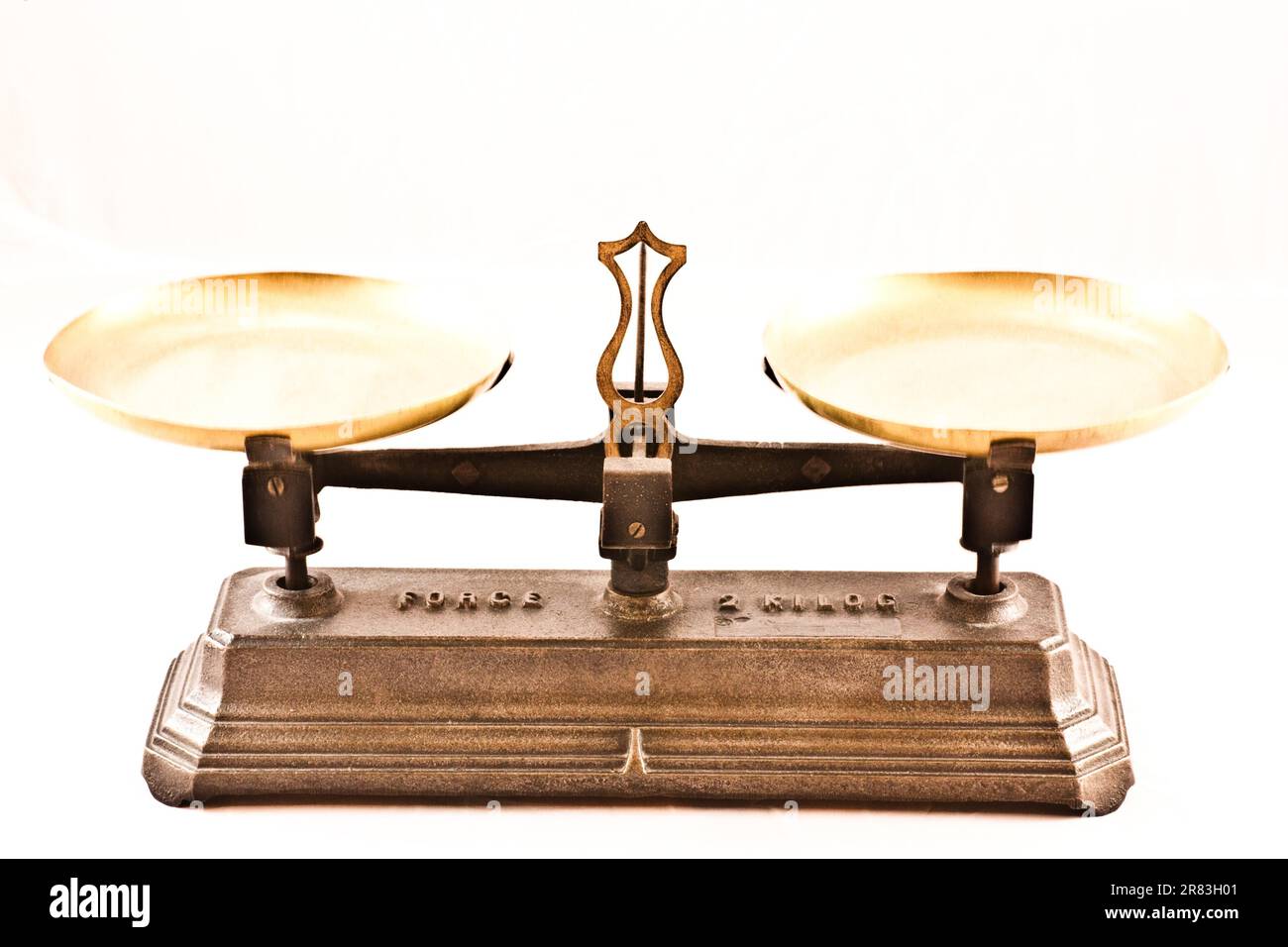 An antique scale on white background, useful for conceptual Stock Photo ...