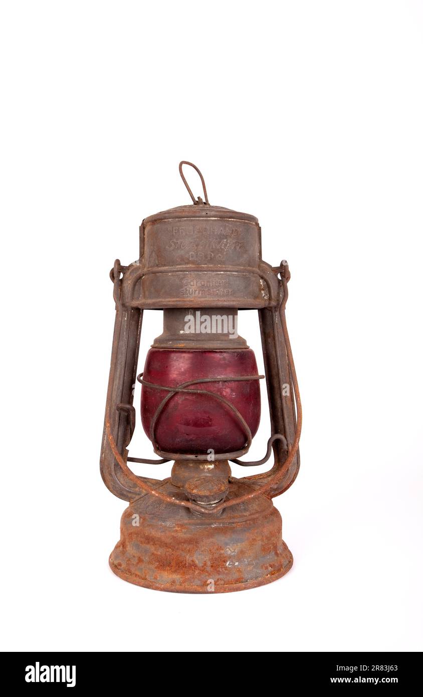 Old rusty lantern against a white background Stock Photo - Alamy