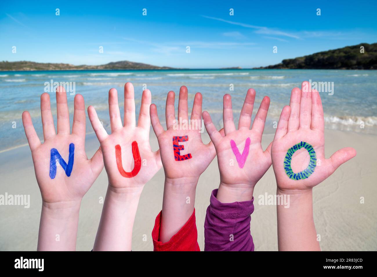 Children Hands Building Colorful Spanish Word Nuevo Means New. Summer ...