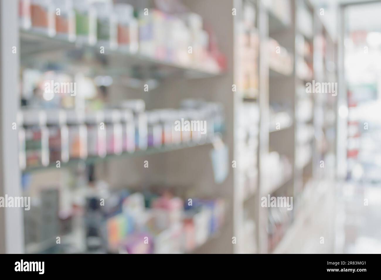 Pharmacy blur background with medicine on shelves Stock Photo - Alamy