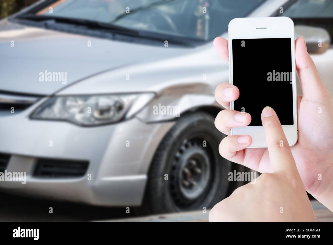 hand holding smartphone with Car crash accident background Stock Photo ...