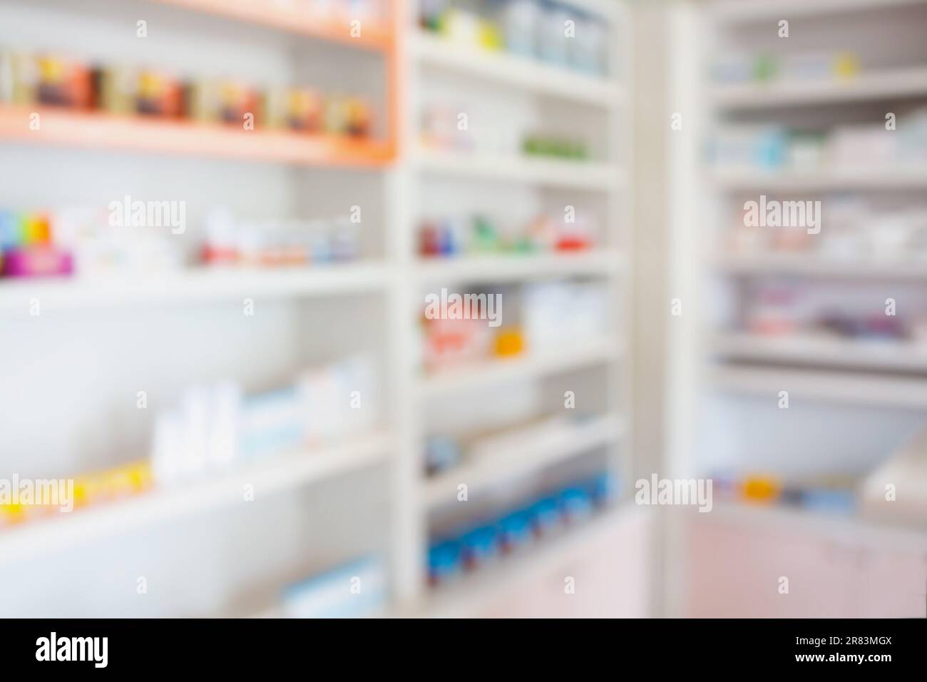pharmacy shelves filled with medication blur background Stock Photo - Alamy