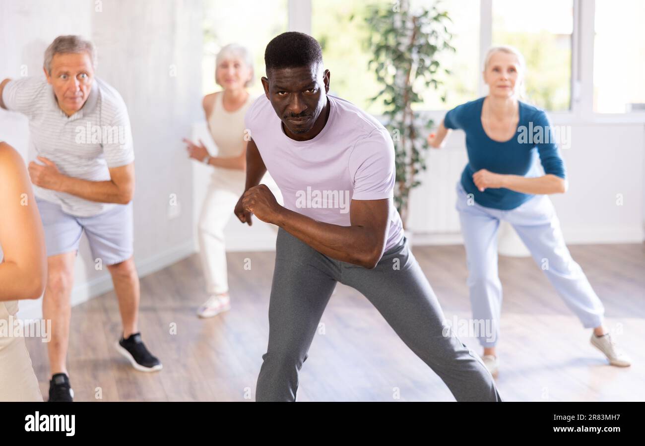African American man dancing hip hop in studio practicing dance number ...