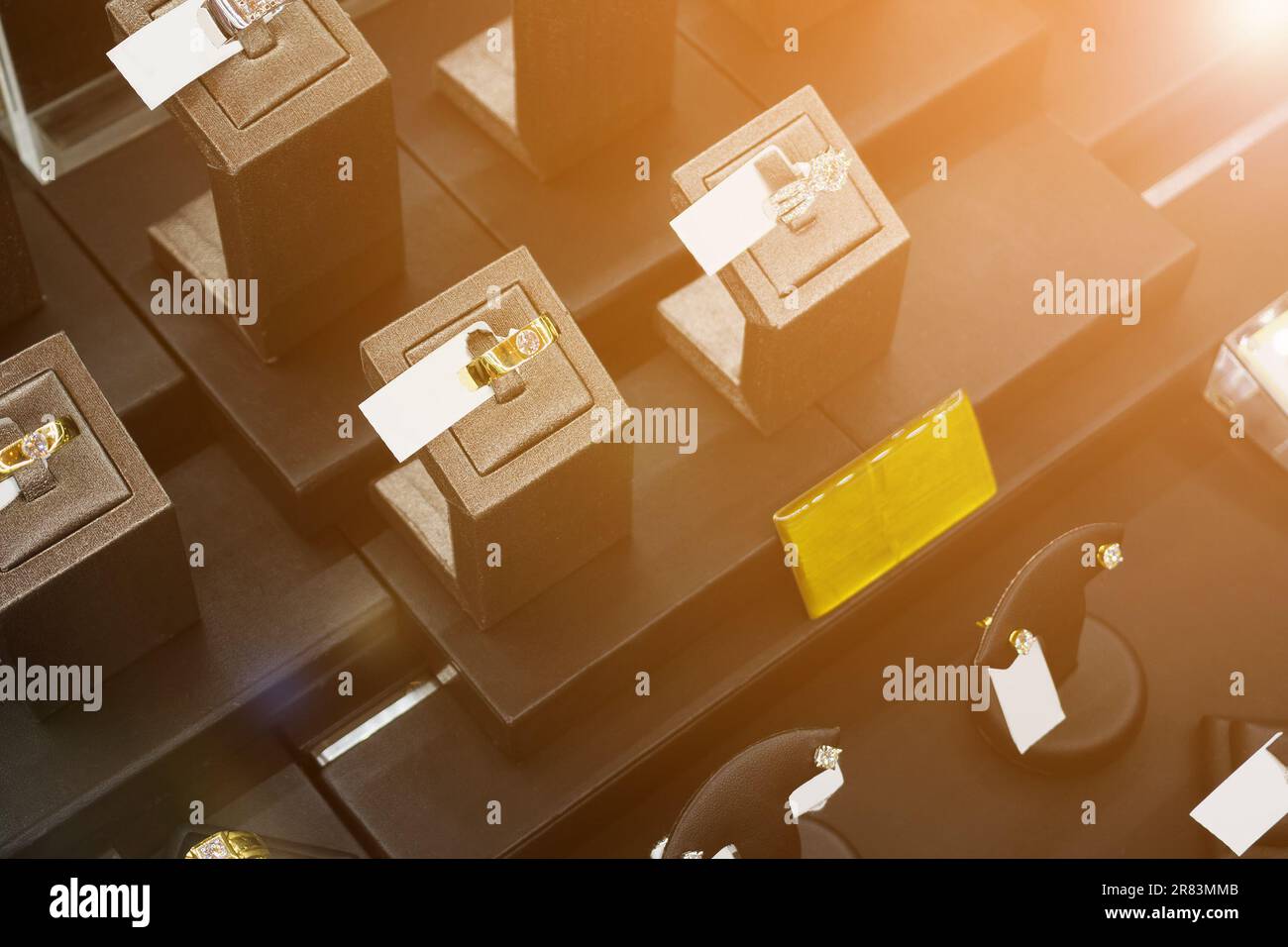 Diamond rings with blank price tag show in jewelry luxury store window ...