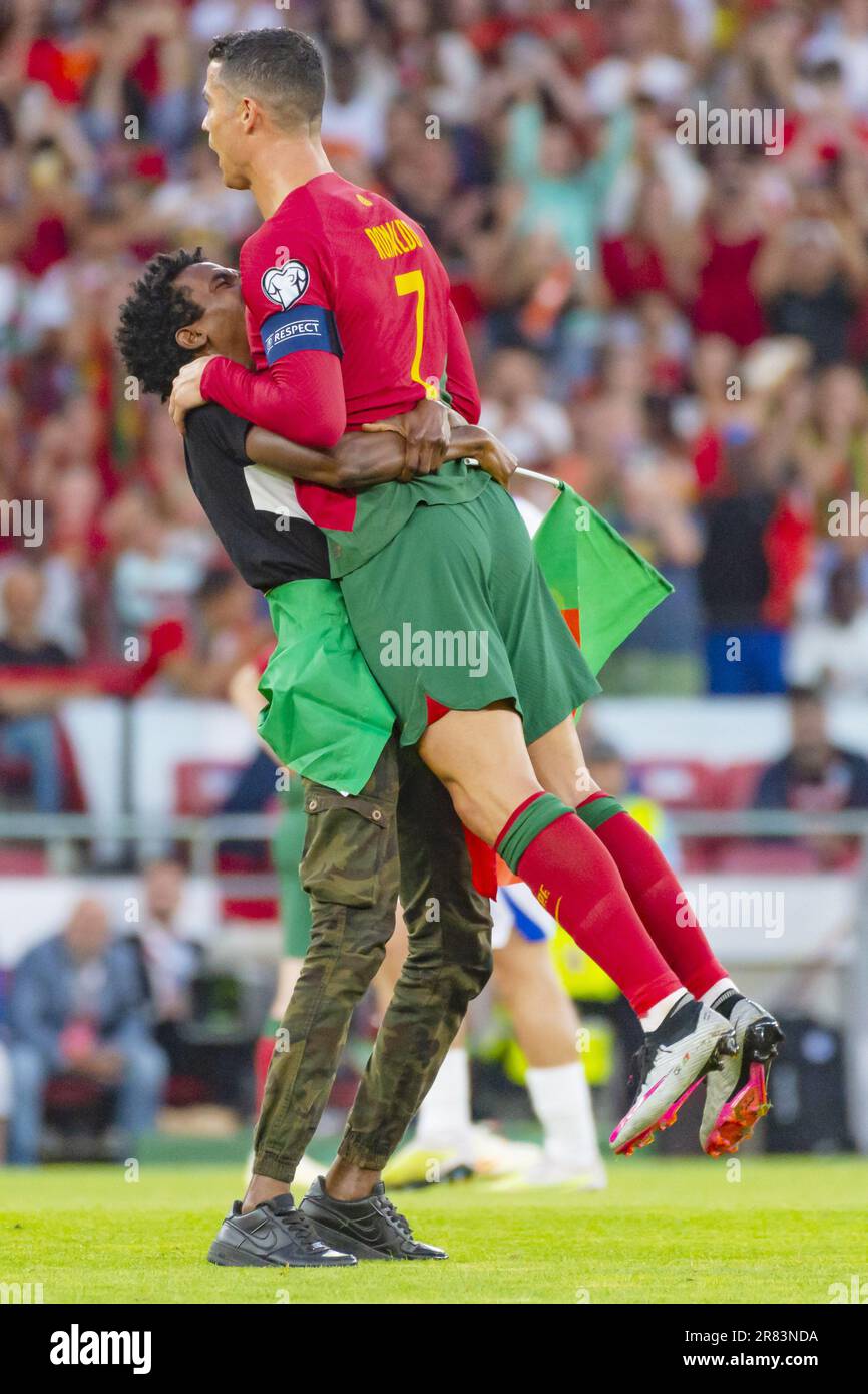 Lisbon, Portugal. 17th June, 2023. A Portugal fan invades the pitch and ...
