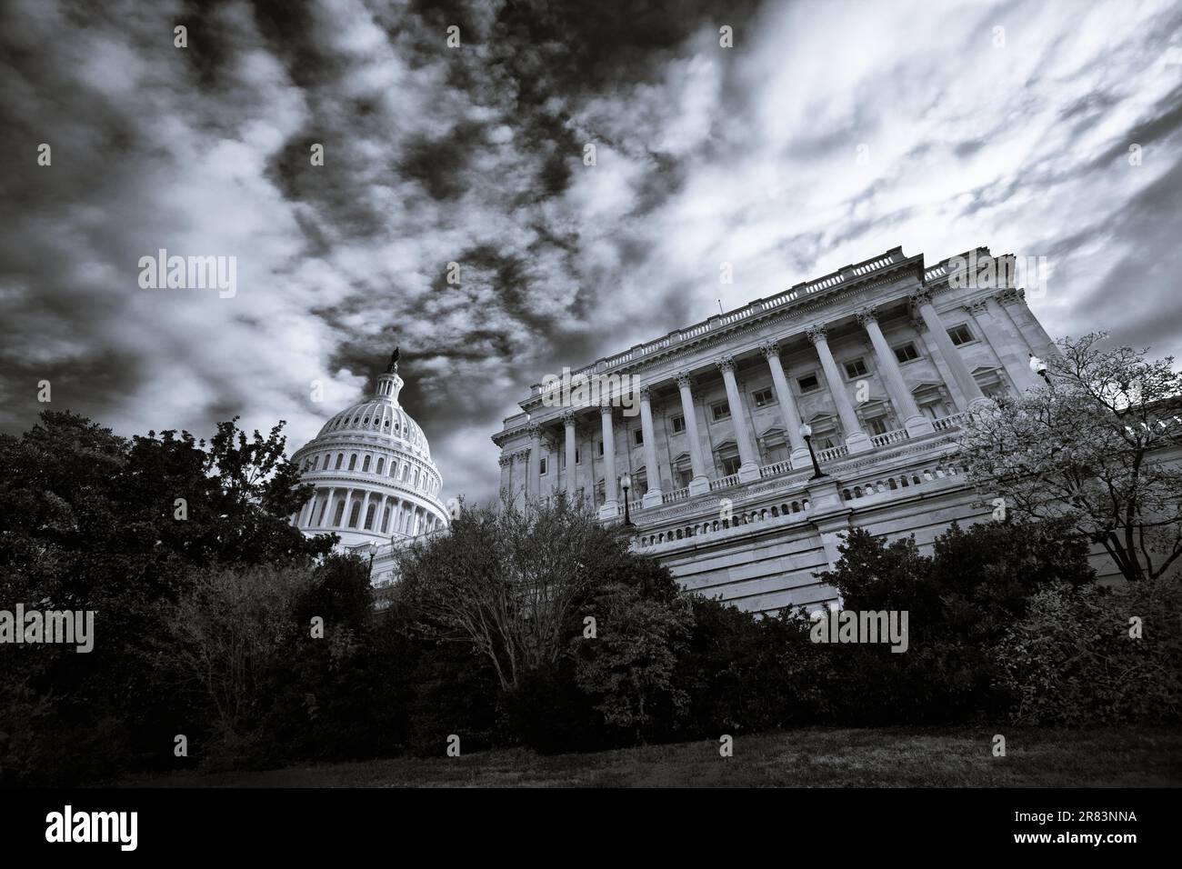 US Capitol in dramatic low angle black and white with sky from House ...