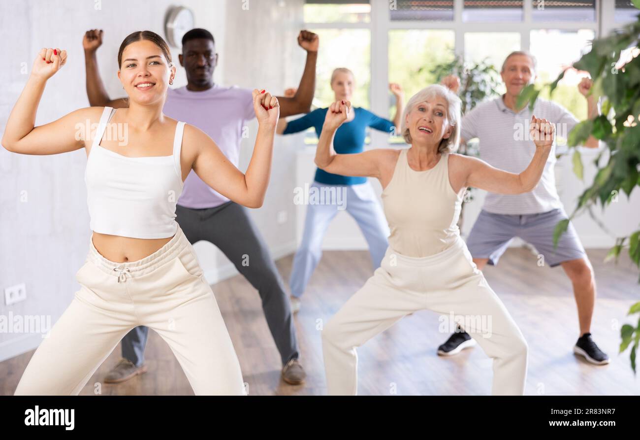 Young girl practicing hip-hop during group dance class Stock Photo - Alamy