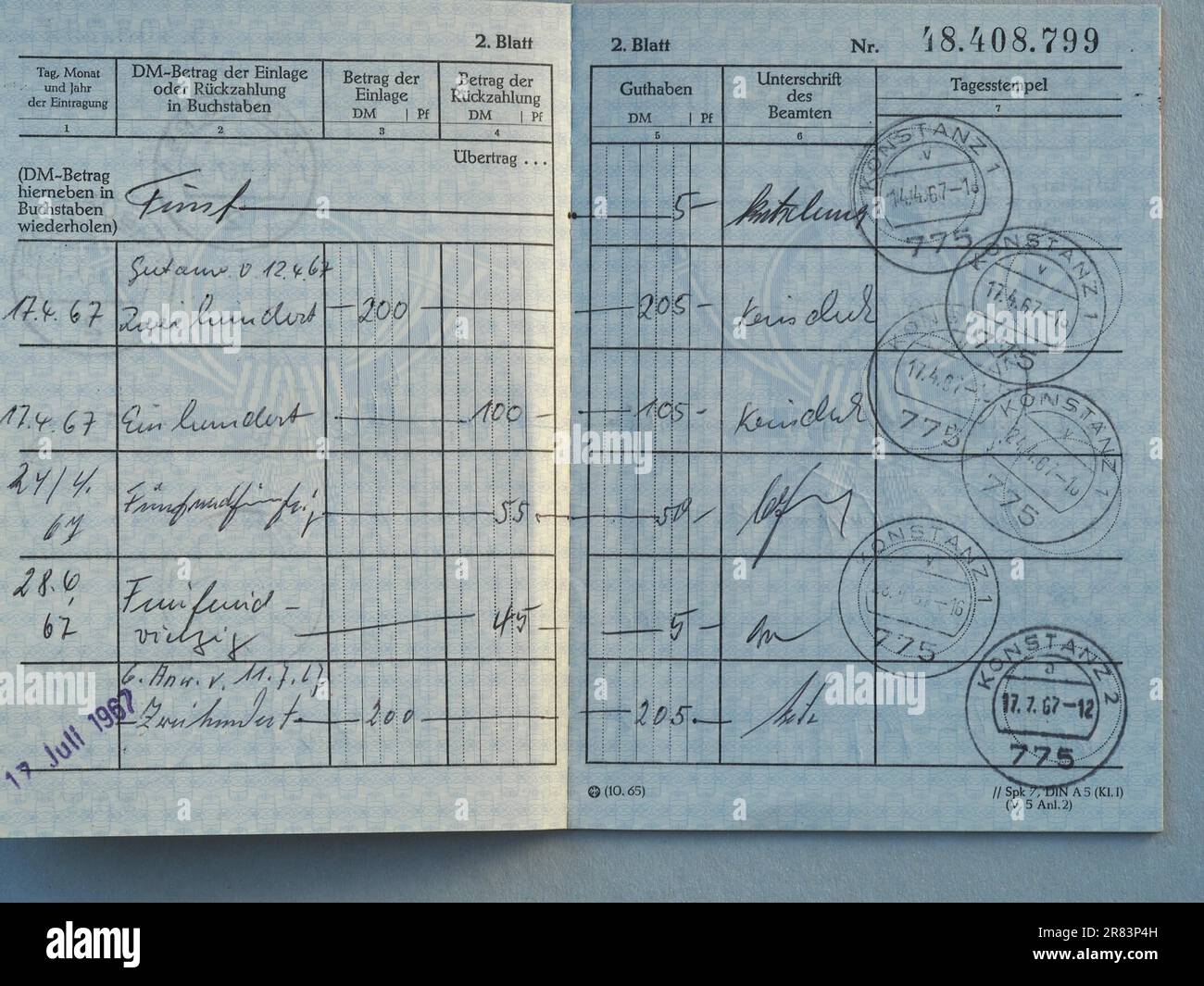 German postal savings book with entry on deposits and withdrawals in ...