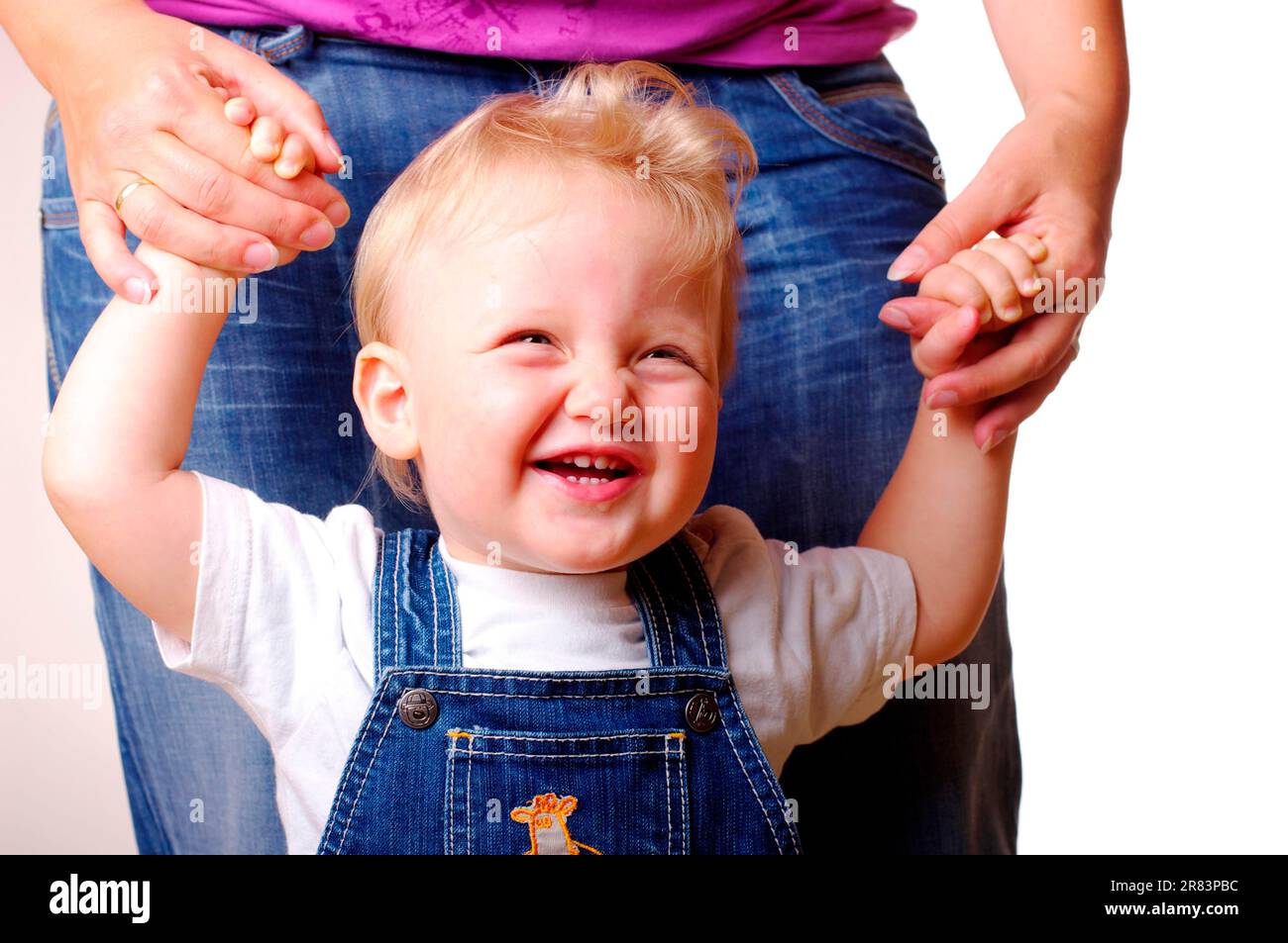 Little boy learns to walk Stock Photo - Alamy