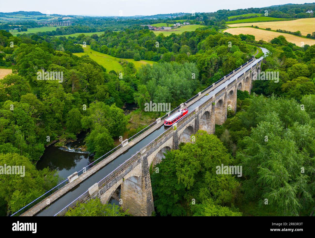 An aerial view of a narrow boat on the Union Canal crossing the River ...