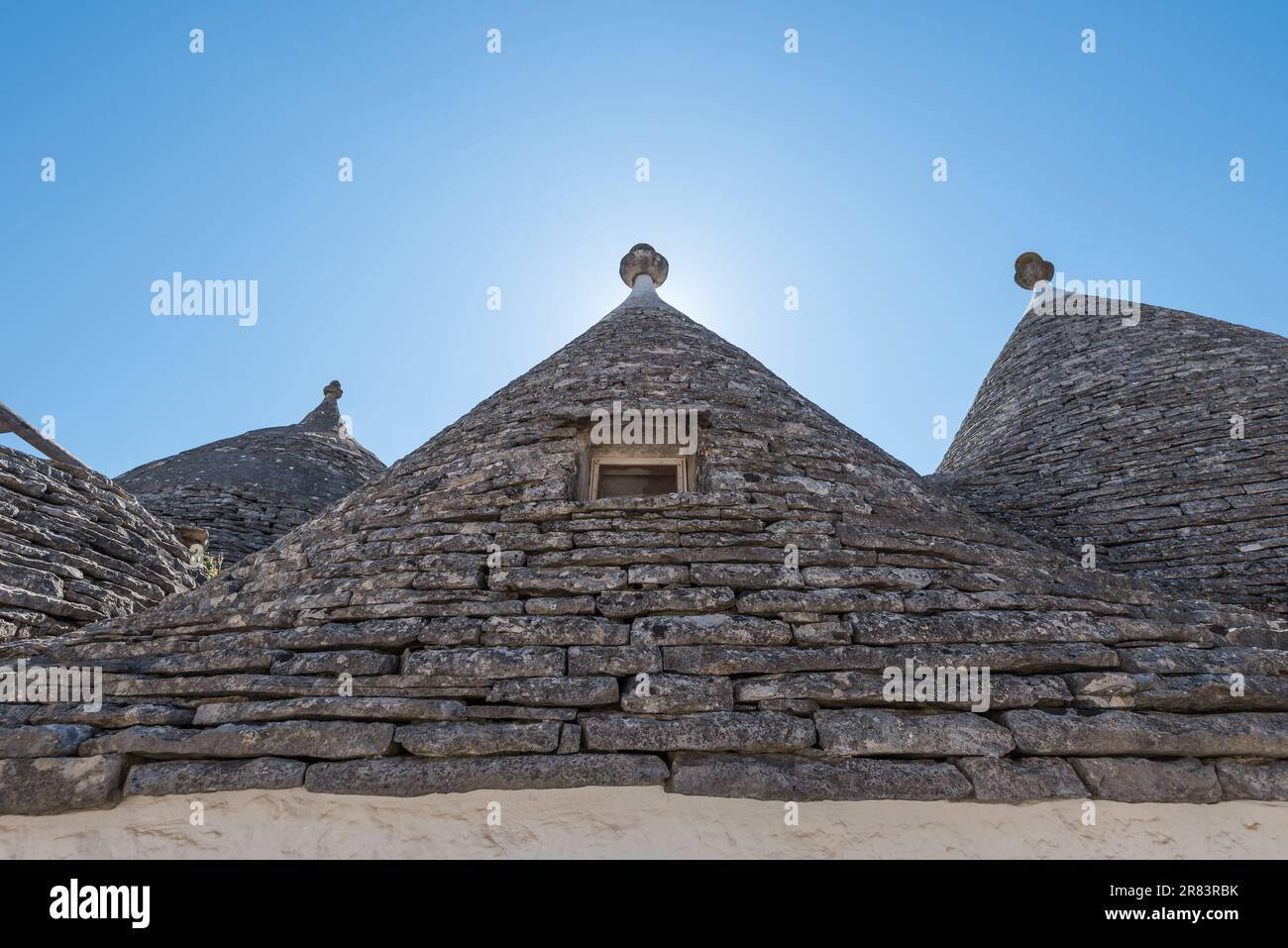 Close up view of trulli conical roofs in Alberobello in Apulia in Italy ...