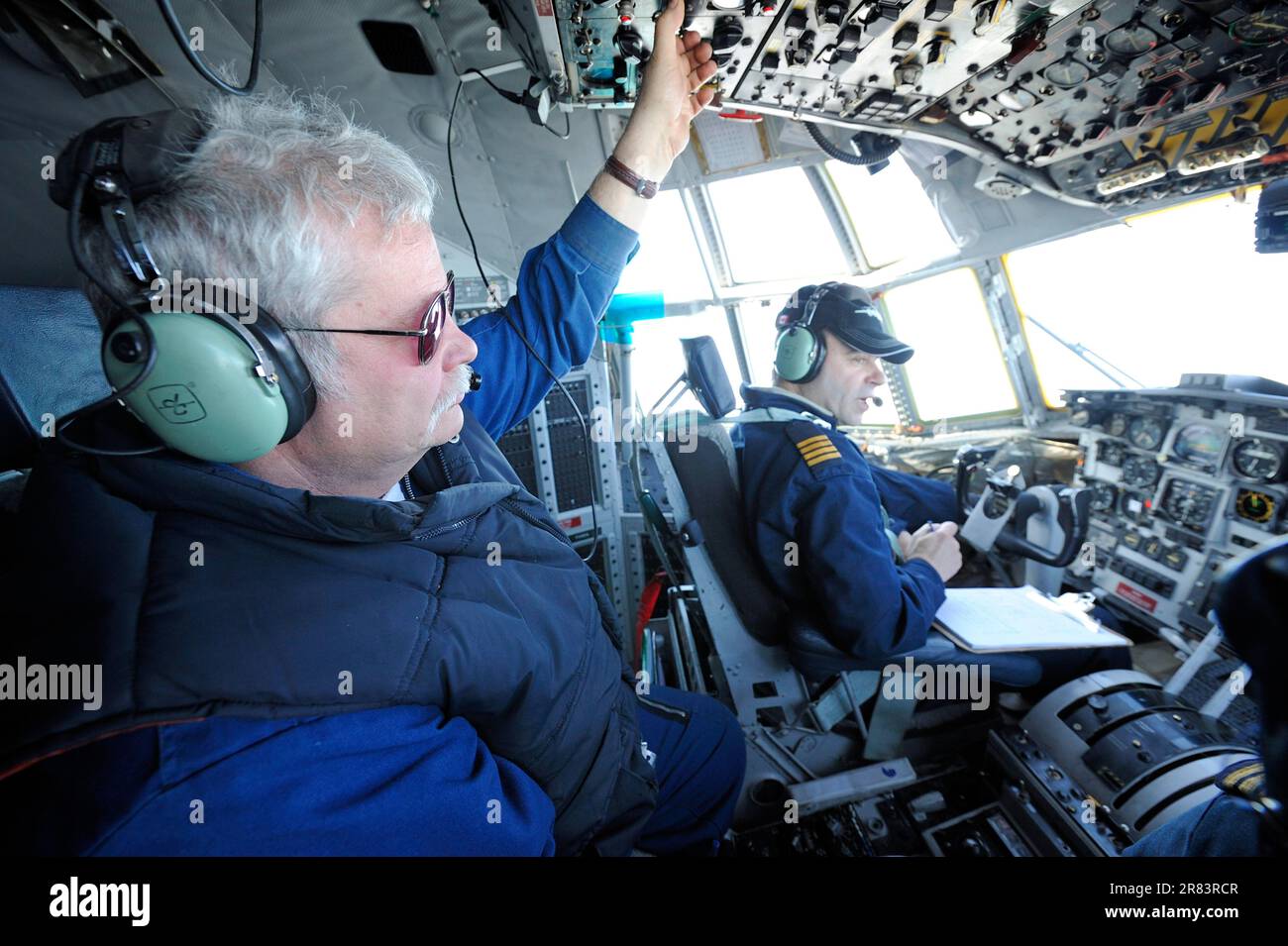 Pilots in Hercules cargo plane, Yellowknife, Northwest Territories ...
