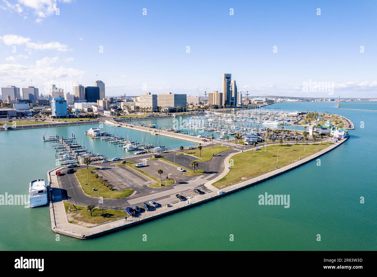 An aerial view of Corpus Christi Downtown Marina surrounded by ...