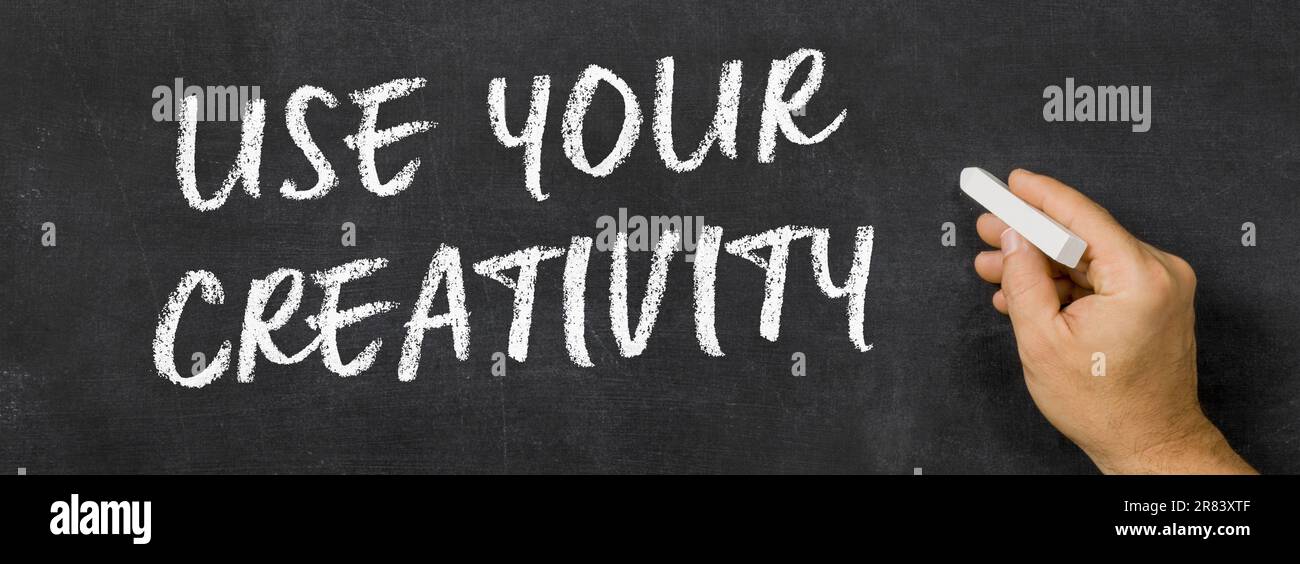Text written on a blackboard - Use your creativity Stock Photo - Alamy