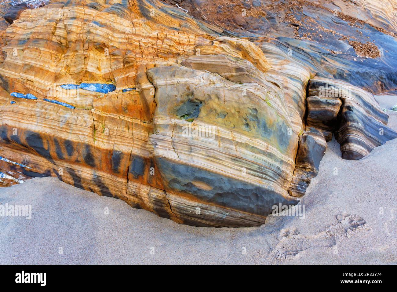 Geological formation of the Californian coastline featuring layered ...