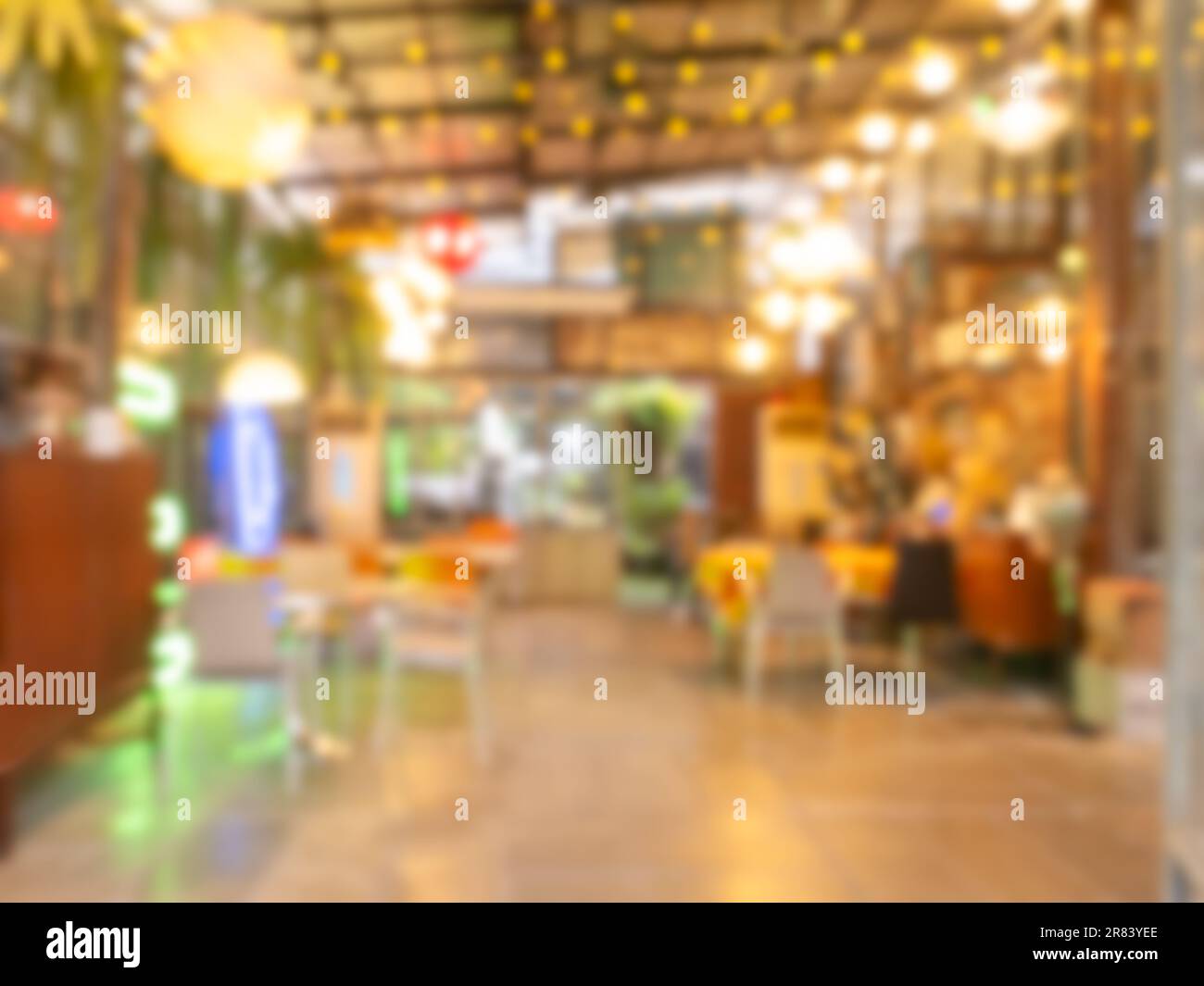Blurred photo of interior restaurant view background with dining table ...