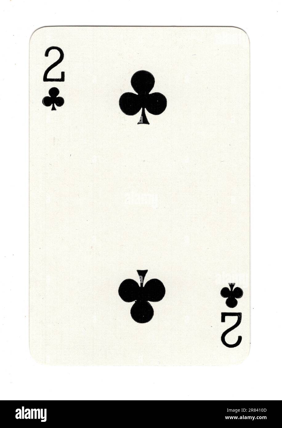 A two of clubs vintage playing card on a white background Stock Photo ...
