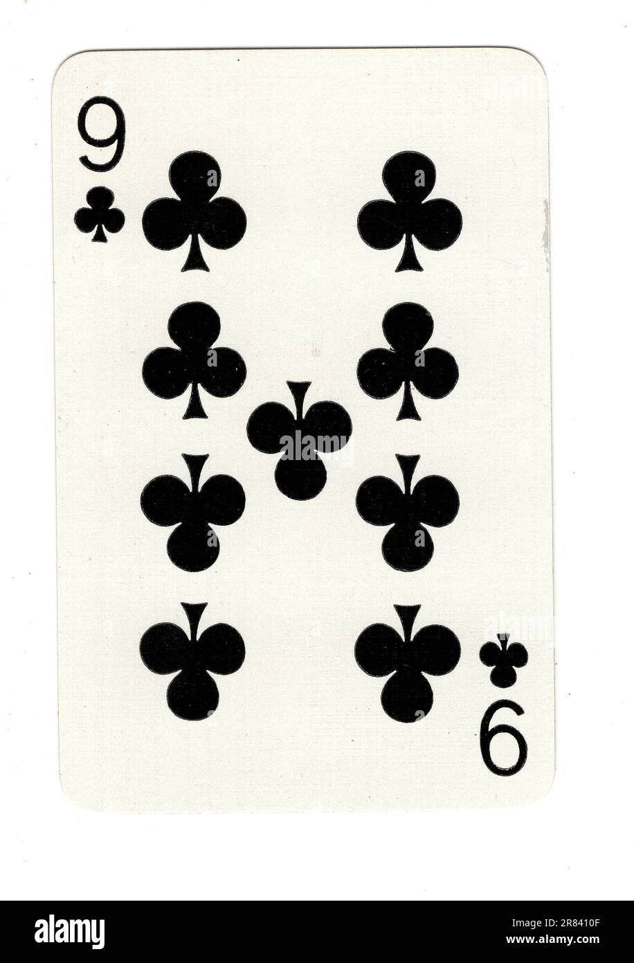 A nine of clubs vintage playing card on a white background Stock Photo ...