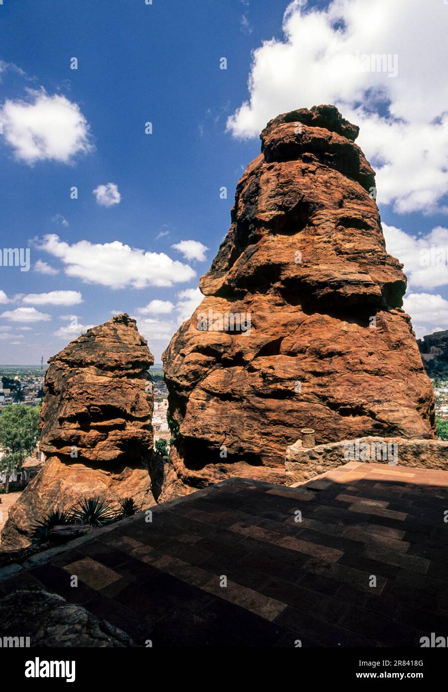 Rust red sandstone cliffs in Badami, Karnataka, South India, India ...